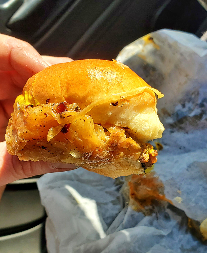 Behold the star of the show&mdash;a slider with perfectly caramelized onions melting into the patty, creating what burger dreams are made of.