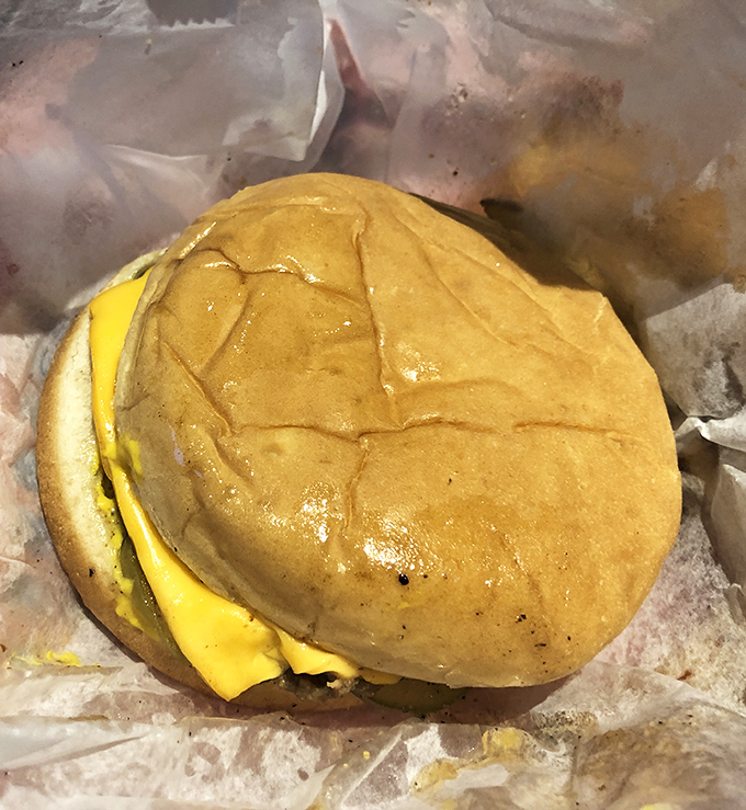 Behold the famous Dyer's cheeseburger in its paper-wrapped glory. That yellow cheese and glistening bun have launched thousand-mile road trips.