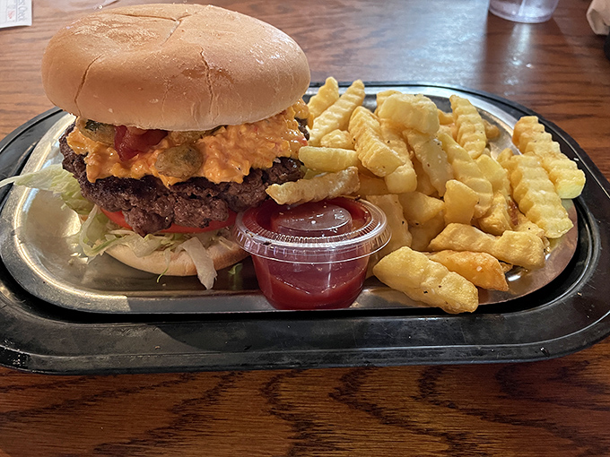 Behold the pimento cheese burger – where Southern tradition meets beef perfection. That cheese-to-patty ratio deserves its own mathematical equation.