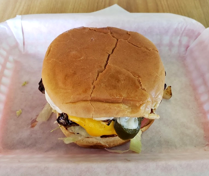 This cheeseburger arrives looking like it stepped out of your best burger dreams, complete with perfectly melted cheese.