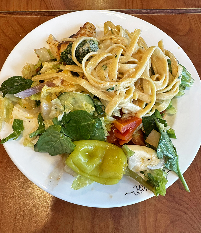 This isn't just chicken Alfredo&mdash;it's a pasta masterpiece where fettuccine meets garden-fresh veggies in a dance of creamy indulgence.