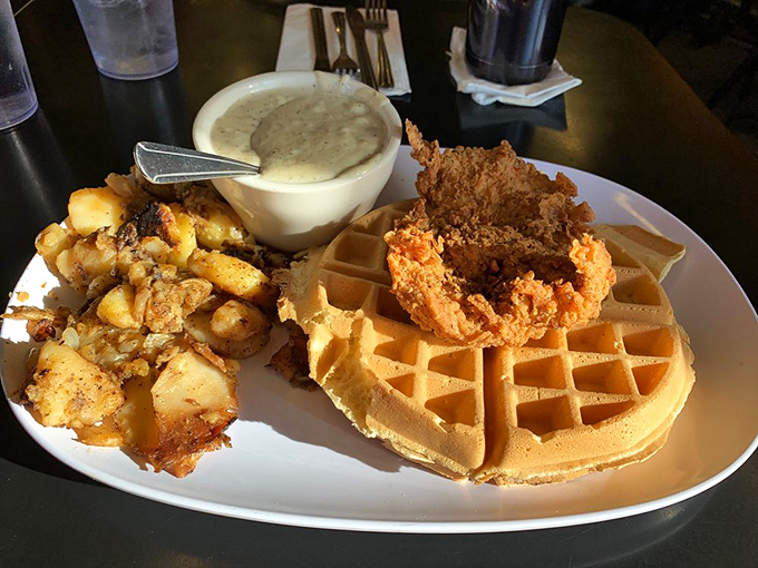 Chicken and waffles: where breakfast and dinner have a delicious identity crisis. That golden waffle is practically begging for its maple syrup baptism.