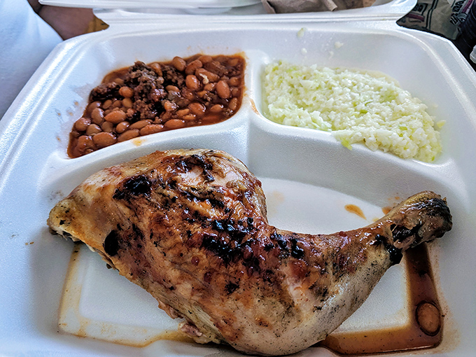 Barbecue chicken that's earned its smoke rings, paired with beans and slaw&mdash;a Southern trinity that needs no explanation.