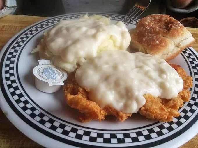 Behold the holy grail of comfort food: chicken fried steak swimming in gravy so good you'll want to write poetry about it.