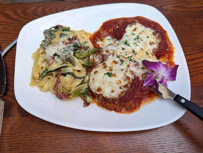 Golden-brown perfection meets bubbling cheese in this chicken parmesan that's earned its legendary status across Ohio.