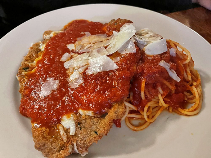Behold the star attraction: chicken parmesan that makes grown adults fight over the last bite like siblings in the back seat.
