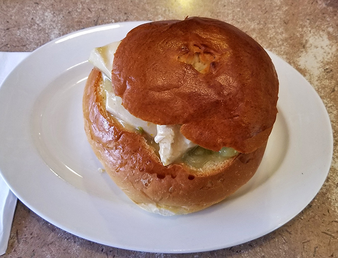 This isn't just an egg sandwich&mdash;it's breakfast architecture at its finest, with layers of goodness nestled inside a perfectly toasted roll.