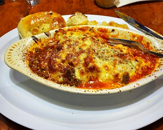 Behold the legendary Chicken Salerno in all its bubbling, cheesy glory. That golden-brown crust is nature's way of saying "good things await beneath."