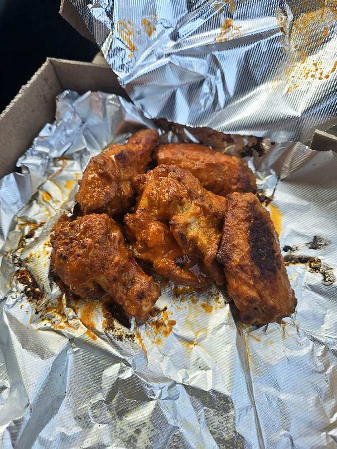 These wings aren't just cooked; they're transformed into crispy-skinned flavor bombs that make you question why you ever ate wings anywhere else.