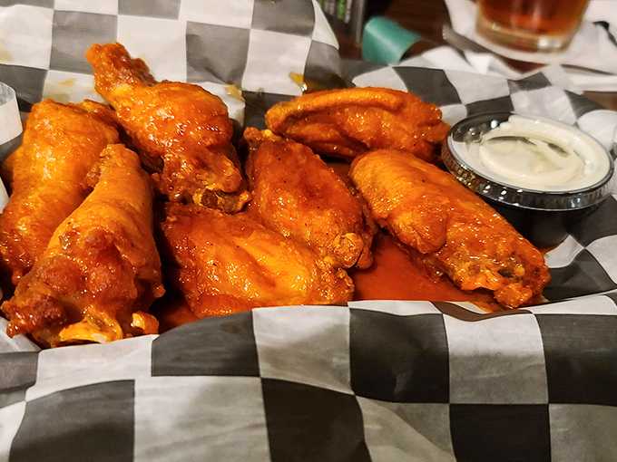 These wings aren't just good&mdash;they're "text your friends immediately" good, glistening with sauce that demands an extra napkin or three. 