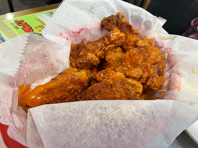 These wings aren't just good, they're life-changing &ndash; crispy, saucy perfection that makes grown adults forget table manners exist.