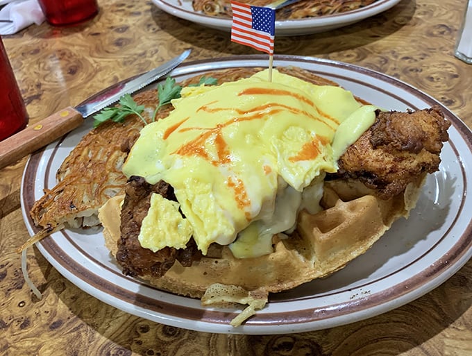 Behold: the holy trinity of breakfast perfection. Golden fried chicken, fluffy waffle, and eggs that would make a rooster proud.