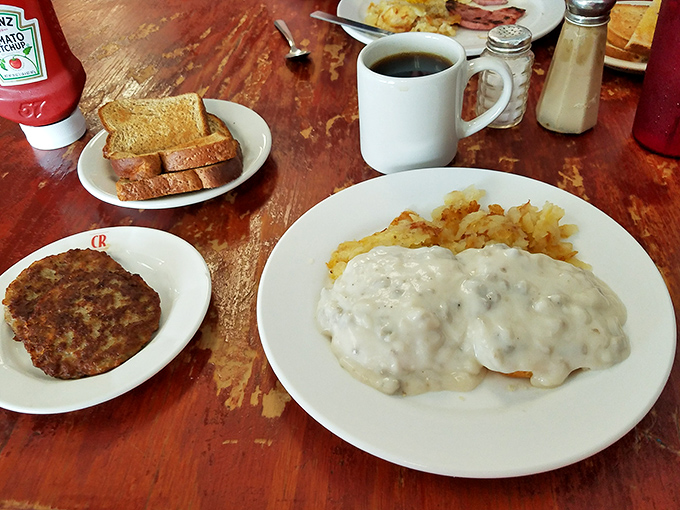 The ultimate comfort plate: Chicken fried steak, smothered in gravy, paired with hash browns and toast. A breakfast that can truly conquer the world.