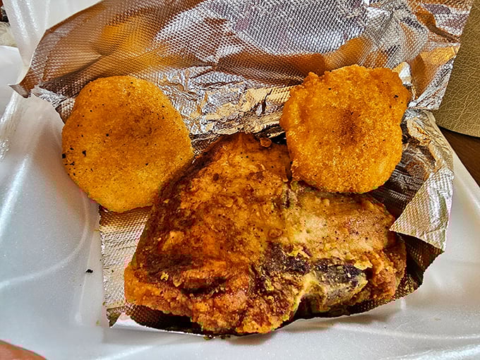 Golden-fried perfection that makes you question every pork chop you've ever eaten before. This isn't dinner; it's a religious experience.