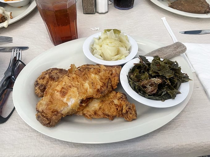 Golden-fried perfection alongside collards and cabbage&mdash;a holy trinity of Southern cooking that makes angels sing and cardiologists wince.