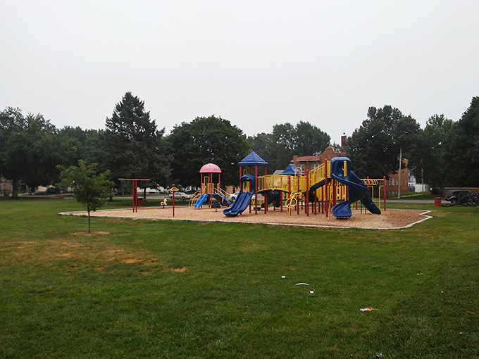 City Park provides a green oasis where kids play while parents pretend they're not exhausted from chasing retirement dreams.