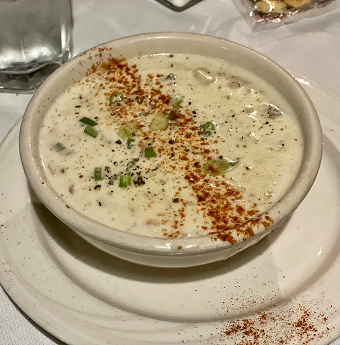 Creamy clam chowder that doesn't know it's 800 miles from the Atlantic. The paprika sprinkle isn't just garnish&mdash;it's the sunset over this bowl of oceanic comfort.
