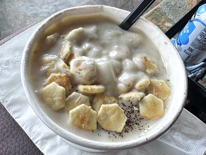 Behold the famous clam chowder - creamy perfection studded with tender clams that'll haunt your dreams.
