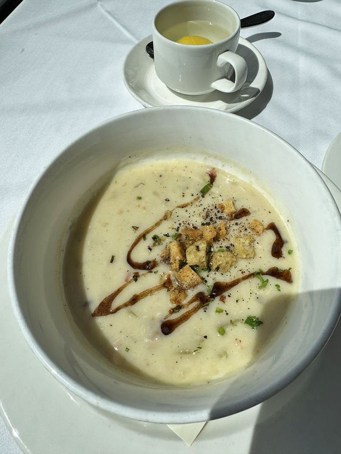 Clam chowder that doesn't hide behind excessive cream&mdash;each spoonful reveals the ocean's secrets with bits of smoky bacon playing hide-and-seek.
