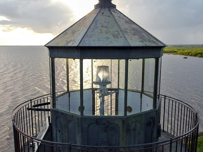 Peek inside the lantern room, where maritime history comes alive. This glass-enclosed crown has guided countless vessels through Louisiana waters.