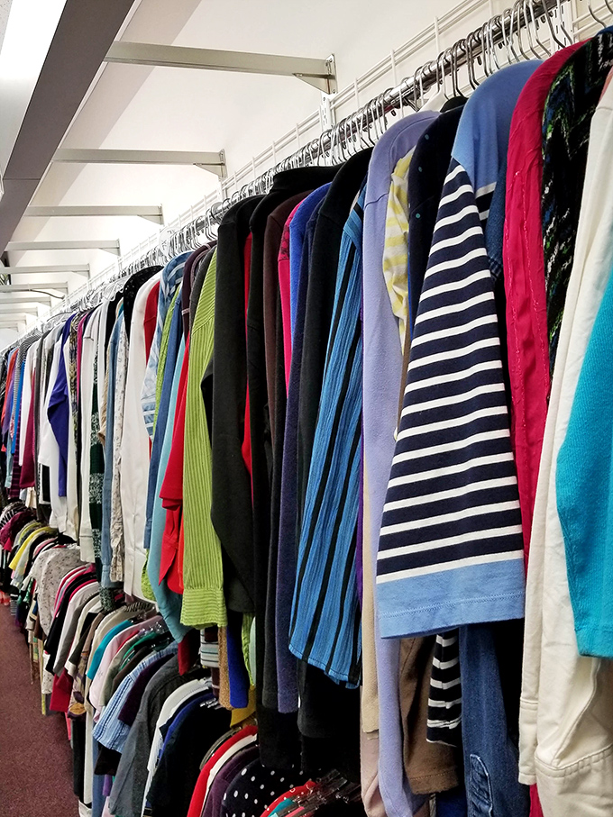 Fashion history hangs in colorful rows. From vintage classics to last season's trends, each garment waits for its second chance at making someone feel fabulous.
