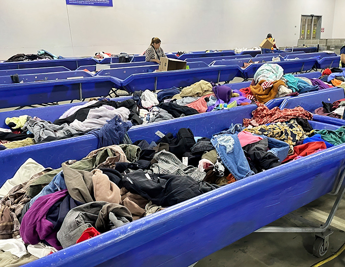 Textile mountain ranges waiting to be explored. Each layer potentially hides that perfect jacket someone mistakenly donated after a closet purge. 