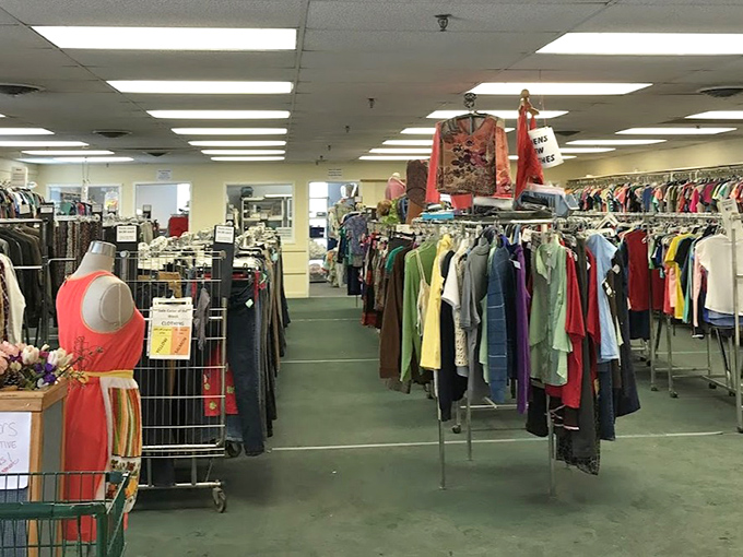 Racks upon colorful racks create a textile labyrinth where fashion from every decade mingles democratically.