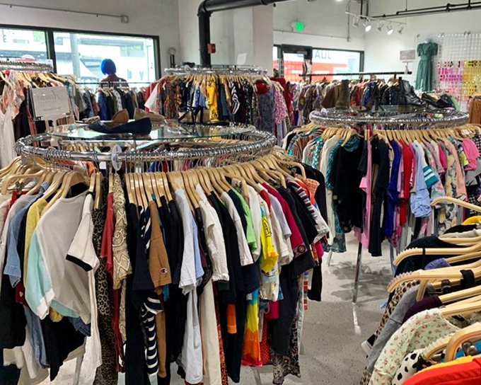 Circular racks creating a fashion maze where getting lost means finding exactly what you didn't know you needed.