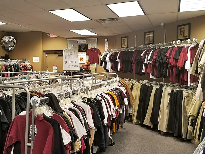 Meticulously organized clothing racks stretch toward the horizon like a well-dressed army, each garment standing at attention for your inspection.