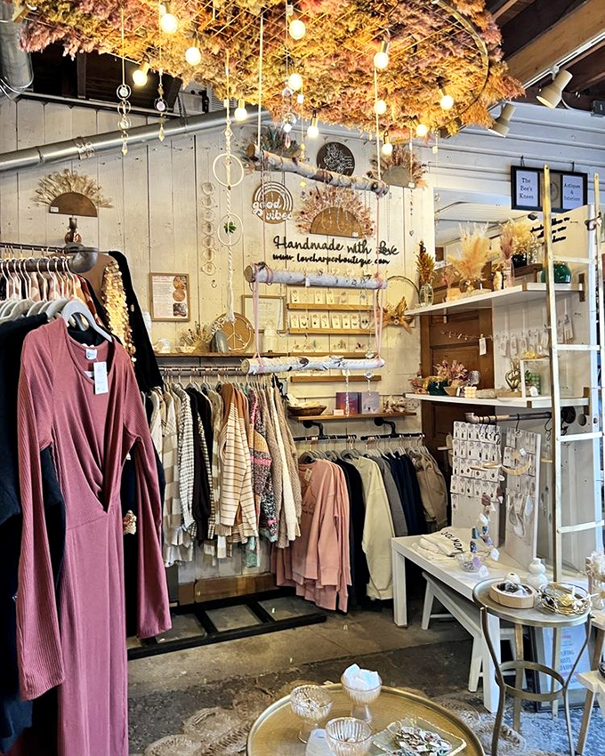 Beneath a canopy of dried flowers, contemporary clothing mingles with vintage treasures&mdash;proof that The Barn isn't just about yesterday's finds.