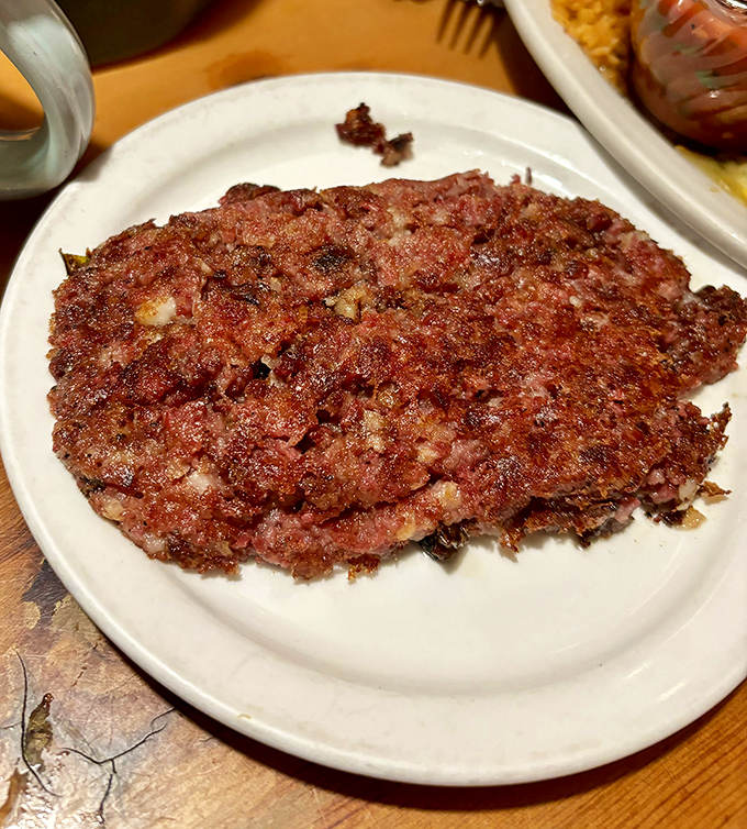 This is the corned beef hash that makes grown adults reconsider their entire breakfast philosophy and life choices.