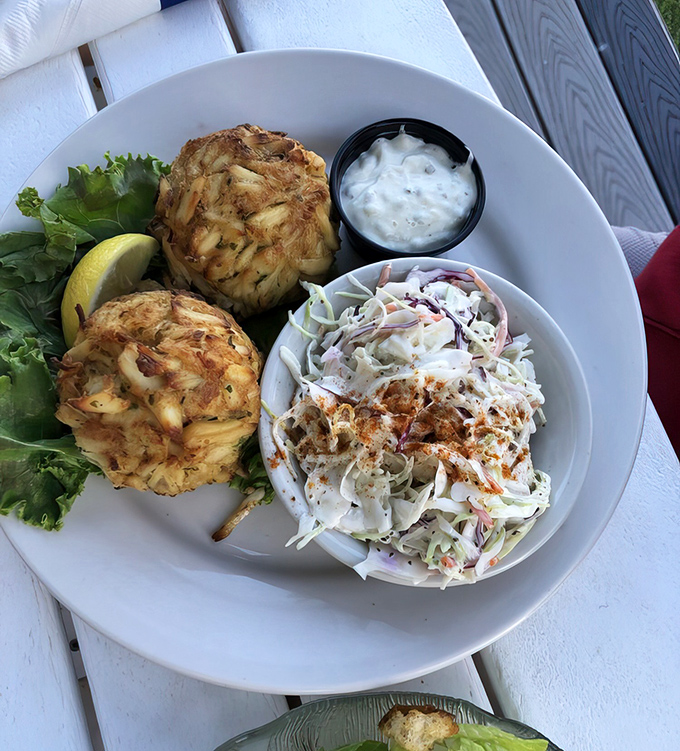 Behold the stars of the show&mdash;two perfectly broiled crab cakes with barely enough filler to hold together the jumbo lumps. That's not a meal; that's edible Maryland heritage.
