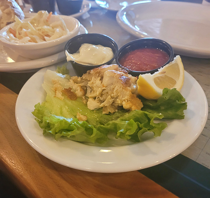 The star of the show: a crab cake so packed with jumbo lump meat, it makes you wonder if they forgot to add filler entirely.