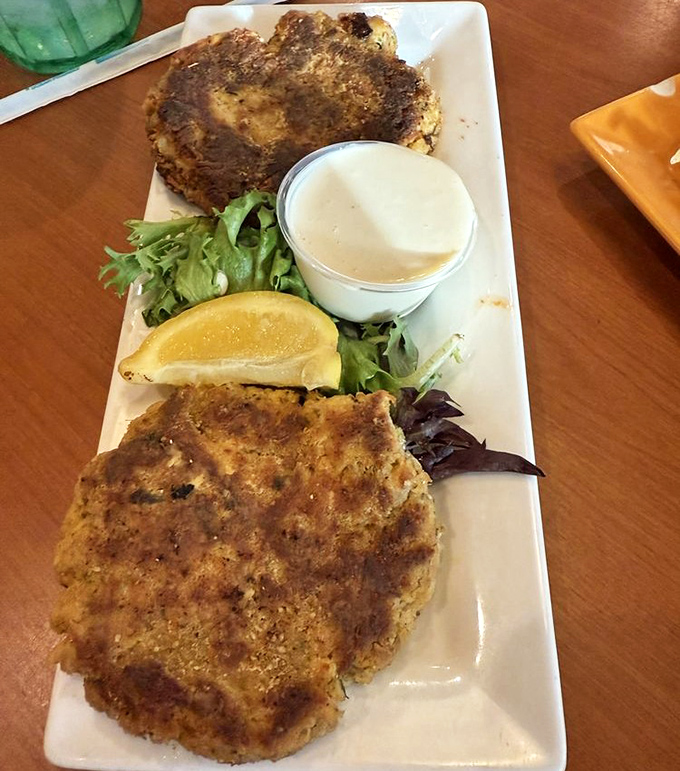 Crab cake perfection isn't a myth&mdash;it's right here on this plate. Golden-brown exteriors giving way to chunks of sweet crab meat that'll haunt your dreams.