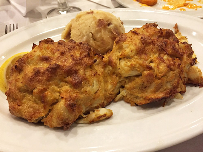 Behold the golden-brown domes of deliciousness – crab cakes so packed with meat they barely need the binding to hold their majestic form.