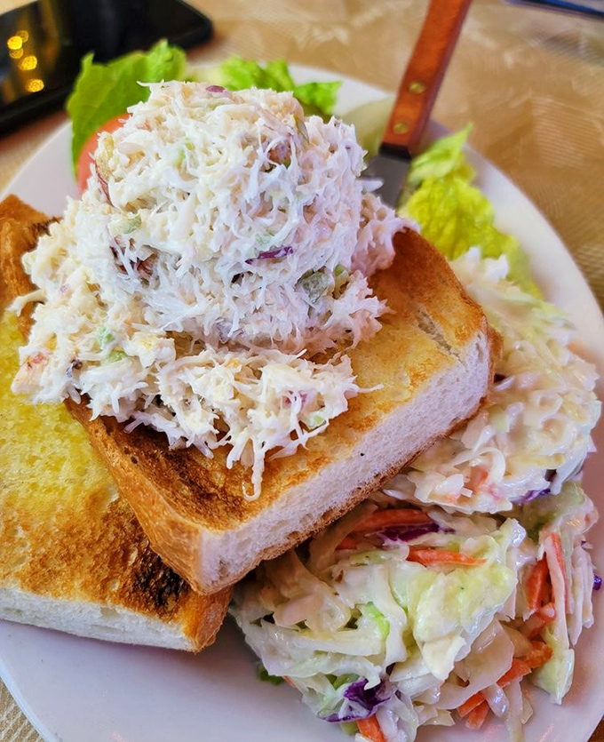 Behold the crab sandwich that launched a thousand return trips &ndash; piled so high it defies both gravity and reasonable portion expectations.