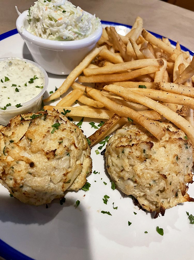 These crab cakes contain so little filler they seem to defy physics. Golden-brown perfection that makes you wonder why you'd ever order anything else.