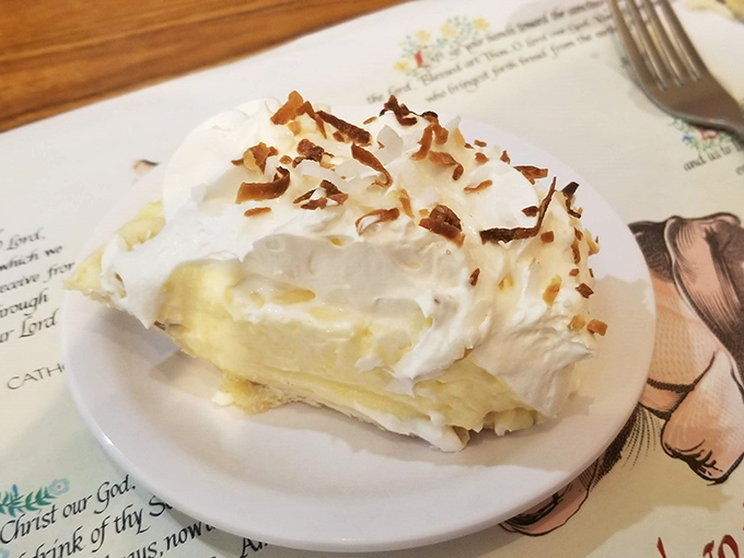 That coconut cream pie isn't just tall, it's architectural &ndash; a fluffy monument to everything good about homemade desserts.