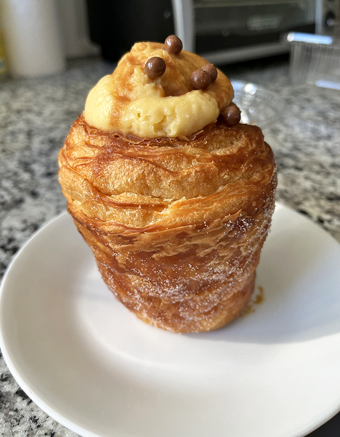 Meet the cruffin: part croissant, part muffin, and entirely responsible for breaking any well-intentioned diet resolutions.