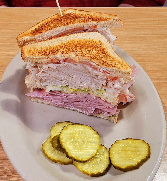 Layer upon glorious layer, this double-decker sandwich doesn't just satisfy hunger&mdash;it obliterates it. The pickle slices are there for moral support.