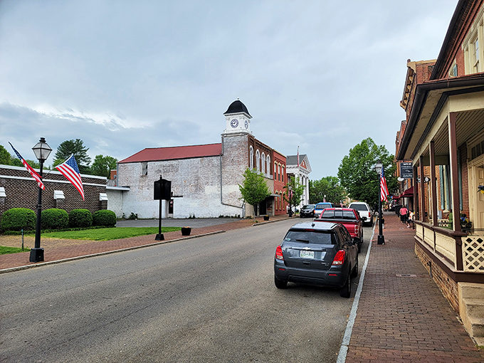 Downtown Jonesborough's clock tower watches over brick-lined streets where modern cars park alongside architecture from another century. Time truly blends here.
