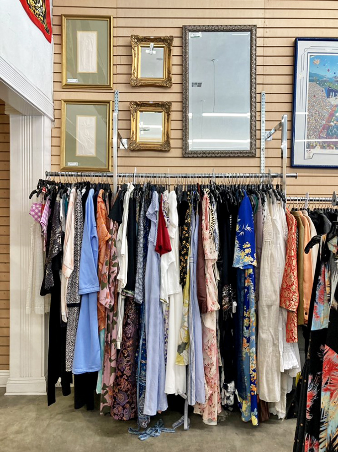 Color-coded clothing racks make browsing a joy rather than a chore. That blue dress is practically begging for a second chance at life!