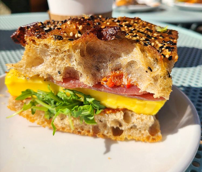 Behold the legendary egg sandwich in all its glory&mdash;sesame-topped bread cradling that perfect sunny scramble and savory ham.
