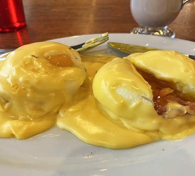 Eggs Benedict that makes you question every other Benedict you've ever met. That hollandaise sauce is performing miracles on those English muffins.