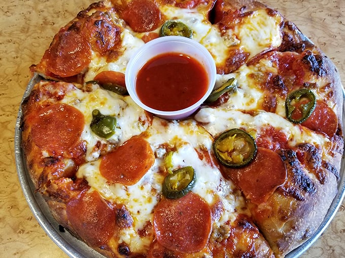 This pepperoni pizza with jalape&ntilde;os brings just enough heat to make you confess your love for it. The side of sauce? That's just good jurisprudence.