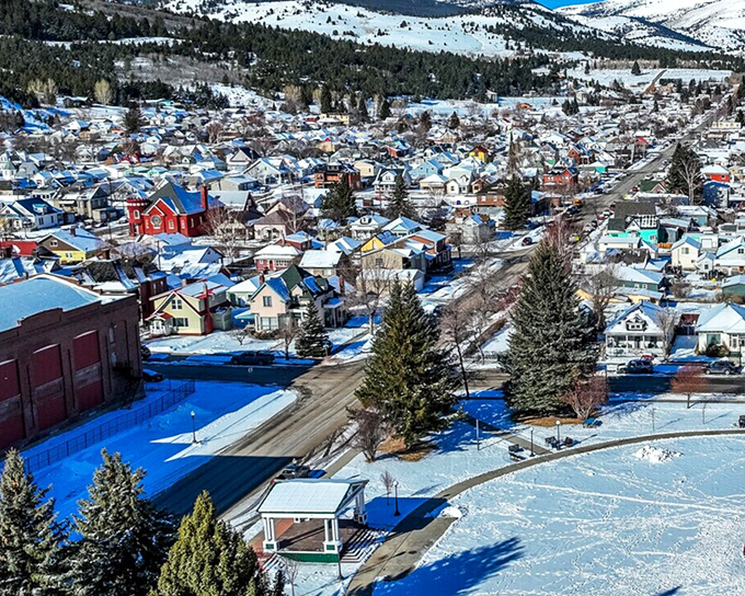 Winter blankets Anaconda in pristine white, transforming the former copper town into a snow globe village nestled against Montana's rugged backdrop.