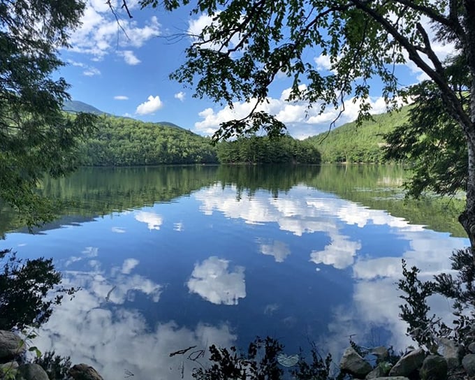 Mirror, mirror on the lake&mdash;who's the fairest view of all? Clouds and mountains compete for best reflection at Emerald Lake.