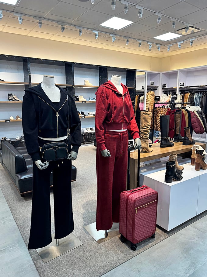 Mannequins sporting coordinated athleisure outfits that silently judge your decision to wear pajama pants to go shopping.