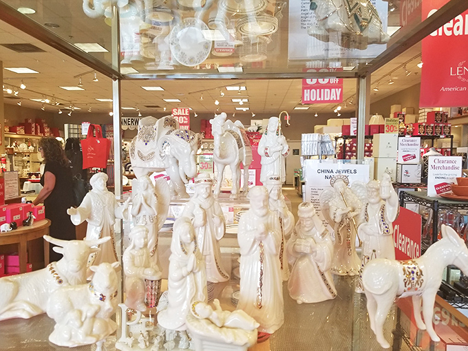 Holiday figurines stand in elegant formation, like a porcelain army ready to march into your home and transform it into a winter wonderland.