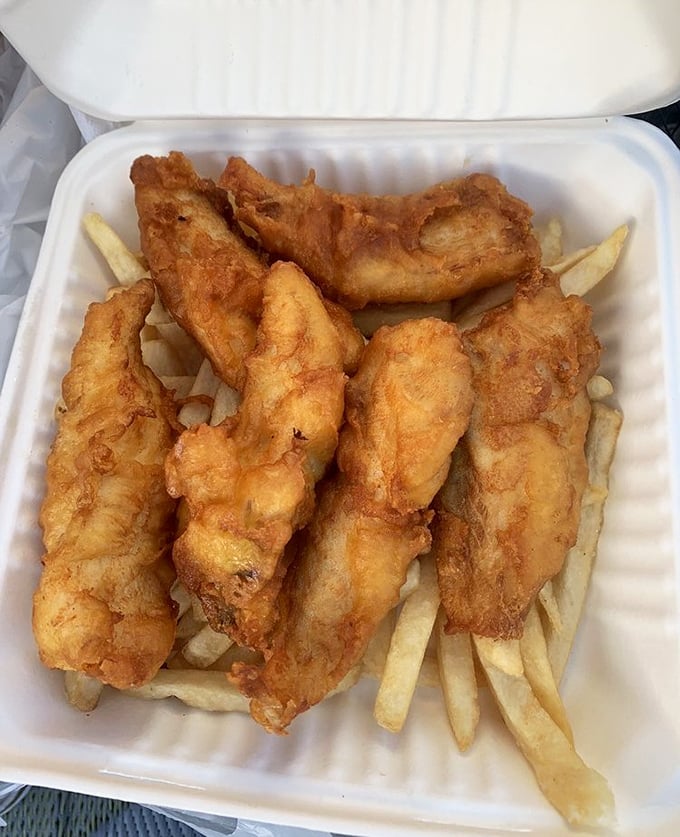 Golden, crispy perfection that makes you understand why people drive for hours. These fish and chips aren't just a meal&mdash;they're a religious experience.